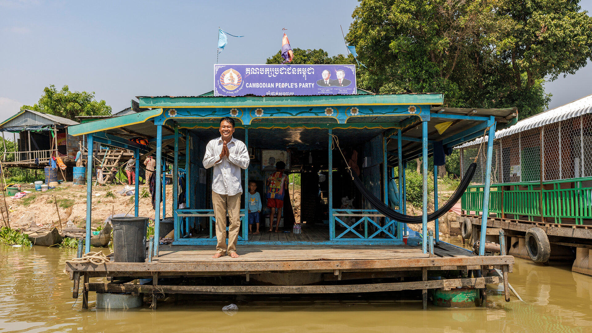 iDE | Families find vocation cleaning up Cambodia's floating villages